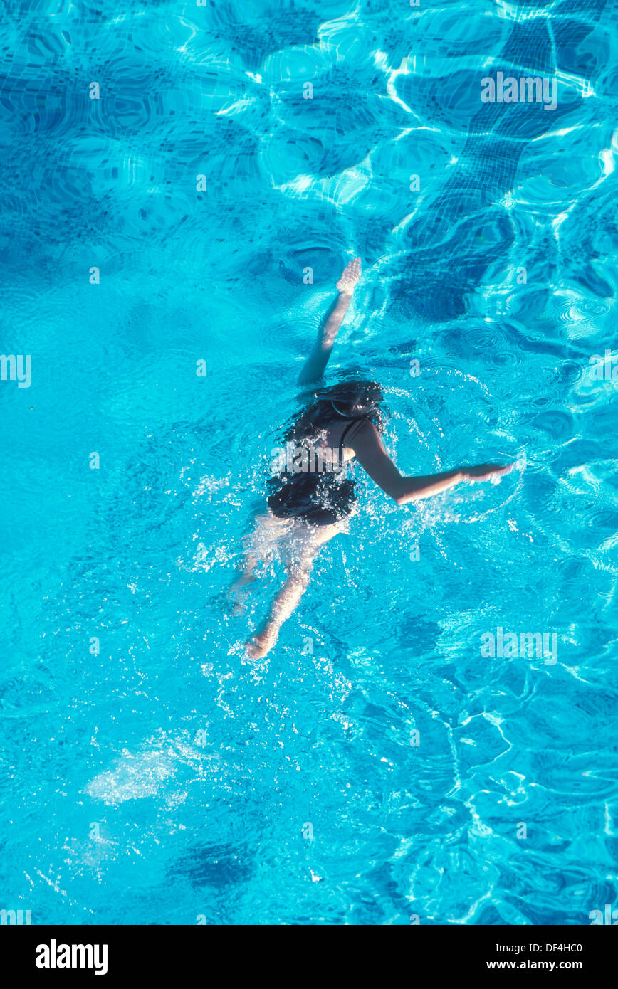 person swimming in swimming pool in the Caribbean Stock Photo - Alamy