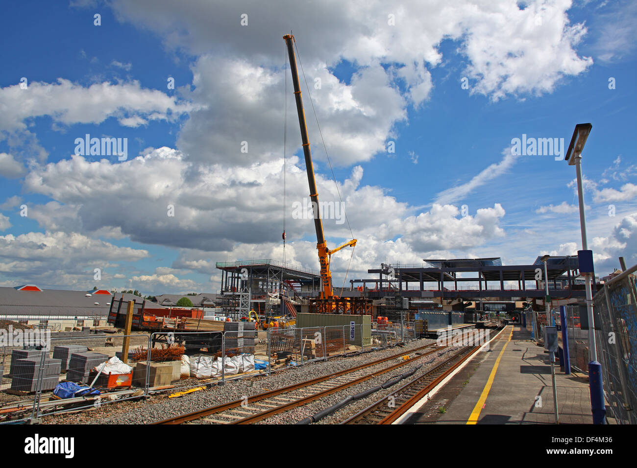A high lift crane preparing to lift a large steel section up into the ...