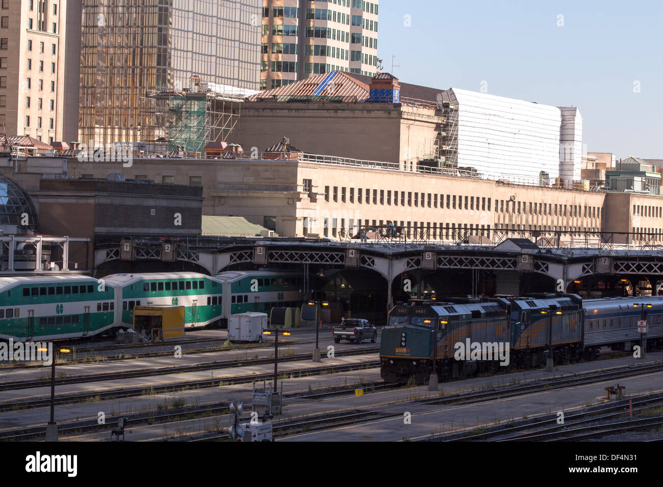 Go train and VIA Rail train leaving Union Station in Toronto on tracks ...