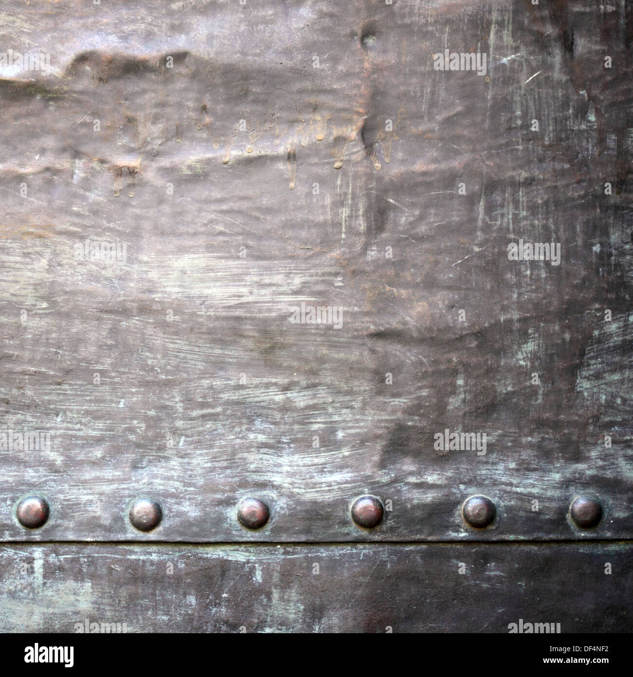 Black grunge metal plate or armour texture with rivets as background ...