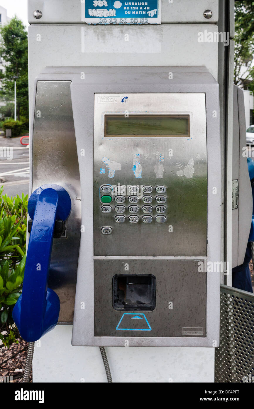 Public telephone on street in Paris, France Stock Photo - Alamy