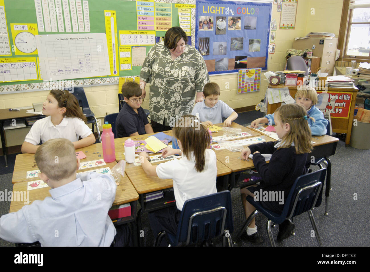 Money boy desk classroom hi-res stock photography and images - Alamy