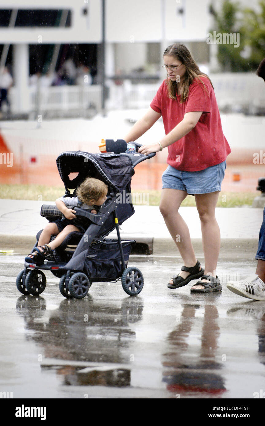 Woman caught in rain hi-res stock photography and images - Alamy