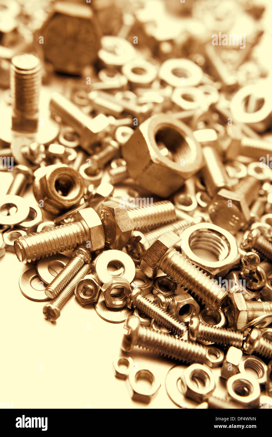 Chrome nuts and bolts closeup Stock Photo - Alamy