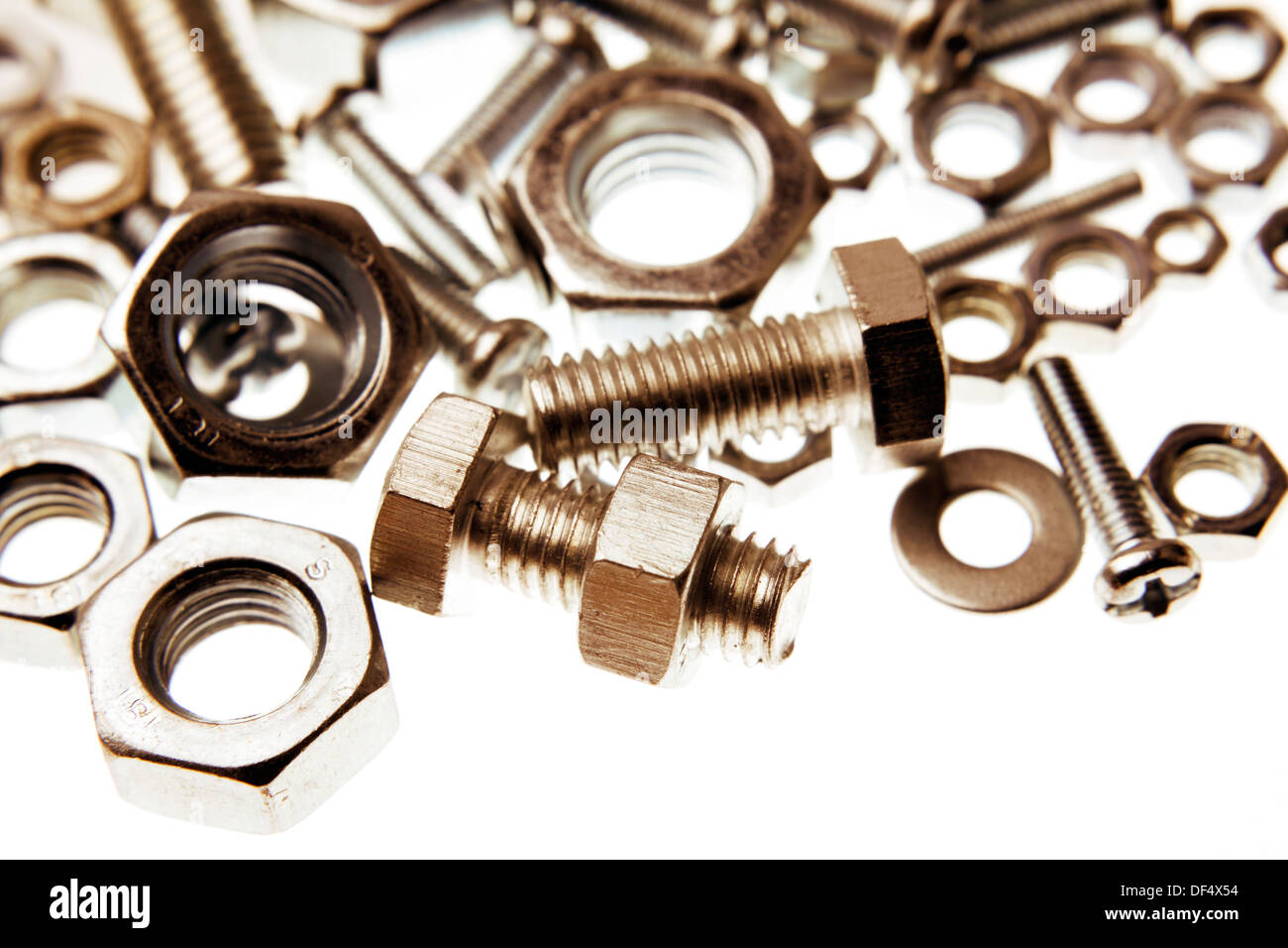 Chrome nuts and bolts closeup Stock Photo - Alamy