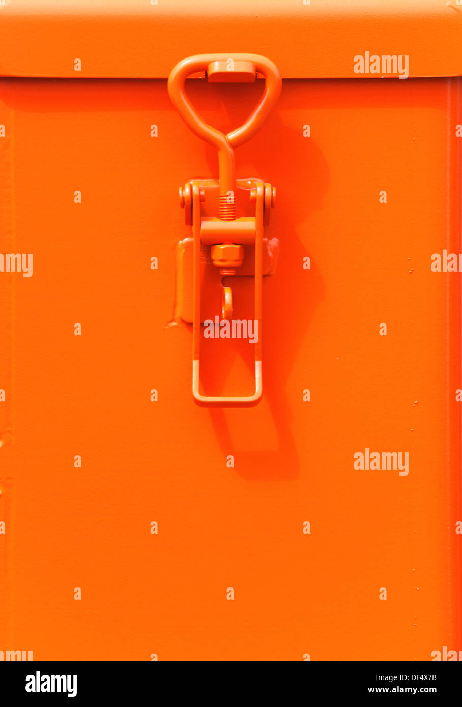 Lock in orange metal industrial big crate box Stock Photo - Alamy