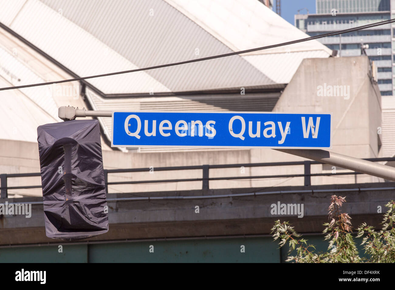 Queens Quay Street sign with disabled traffic light in downtown Toronto ...