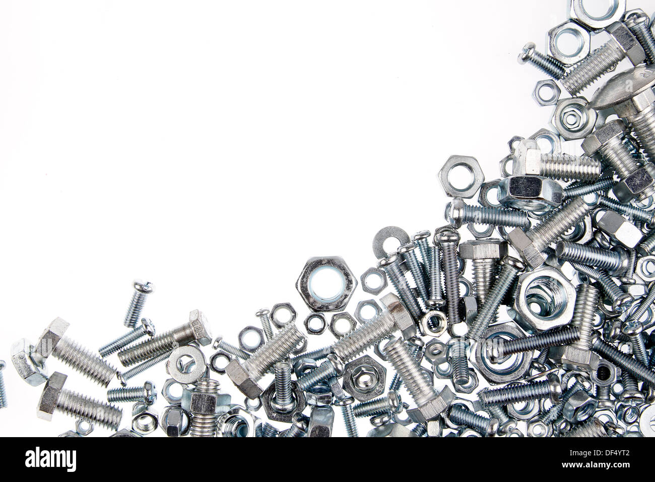 Nuts and bolts closeup on plain background Stock Photo - Alamy
