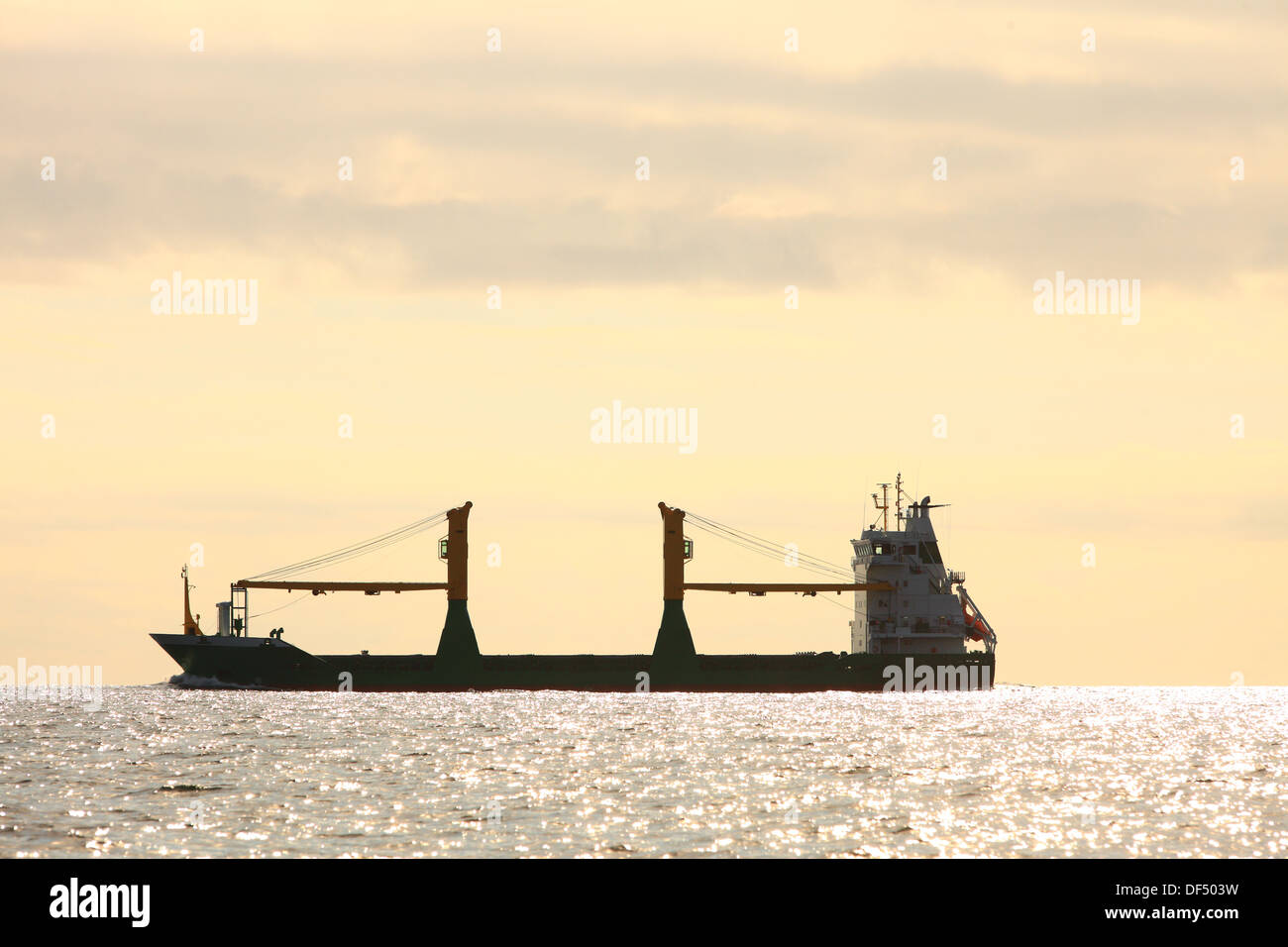Transportation, cargo container ship sailing in still water heading for ...