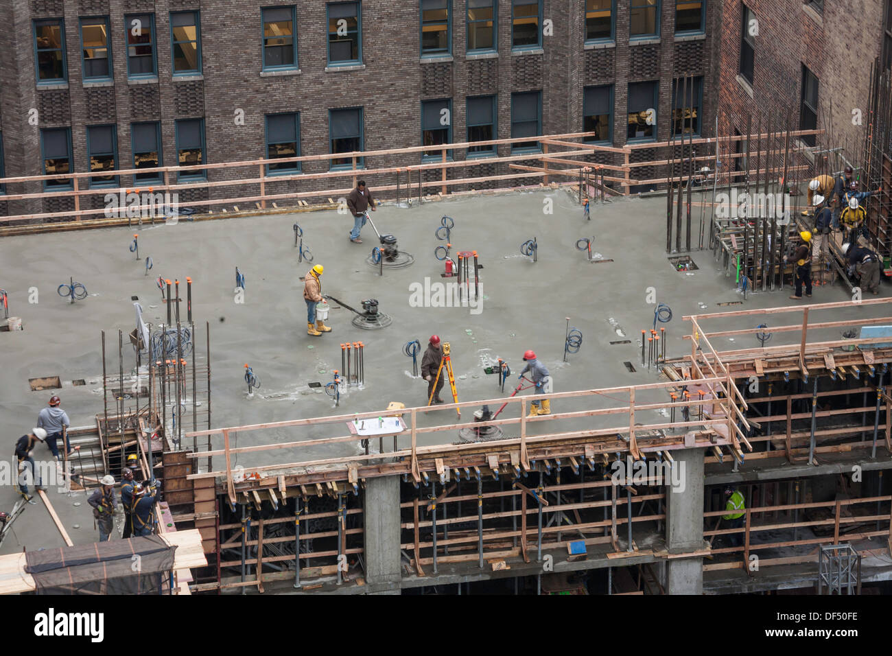 High-rise Building Construction Site with tradesmen (2 of 3 Stock Photo ...
