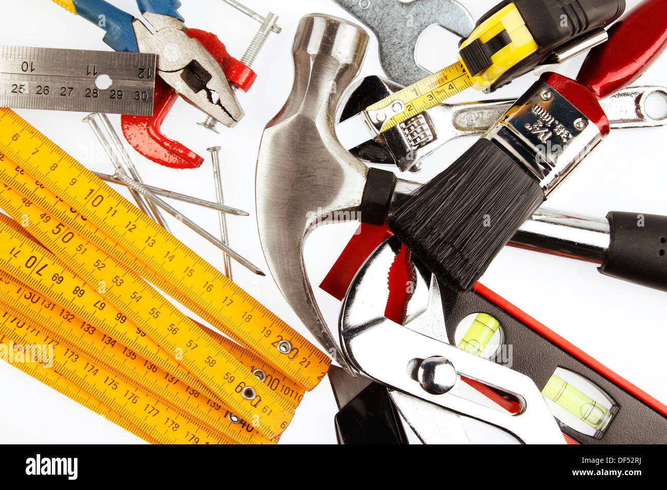 Assortment of tools on plain background Stock Photo - Alamy