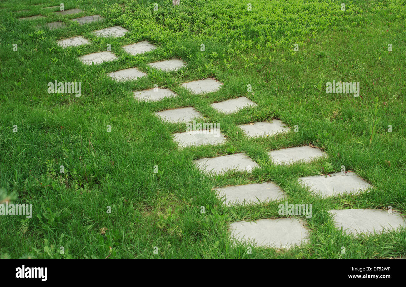 stone walkway on the grass Stock Photo - Alamy