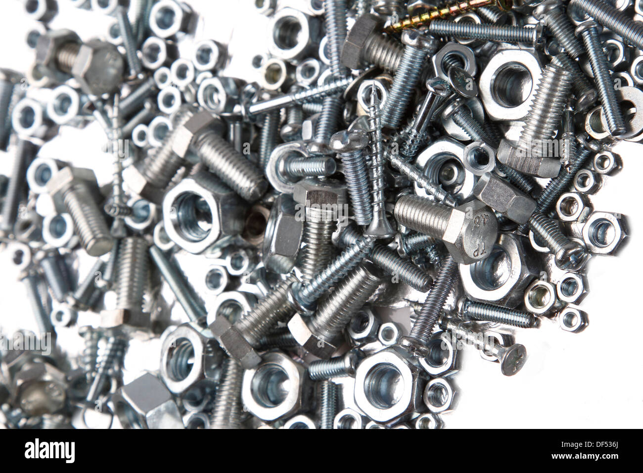 Chrome nuts and bolts closeup Stock Photo - Alamy
