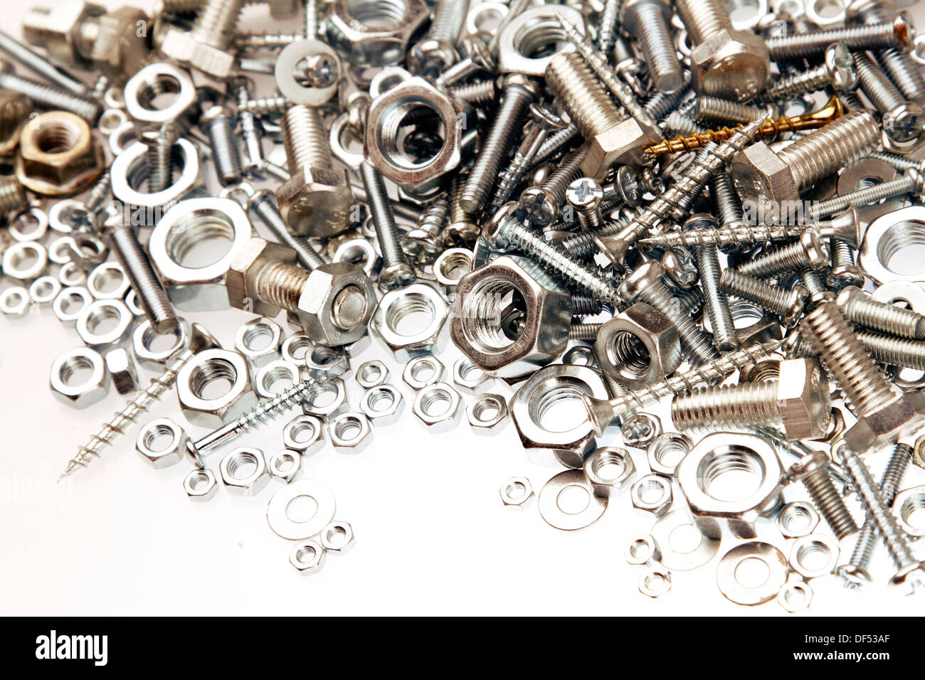 Chrome nuts and bolts closeup Stock Photo - Alamy