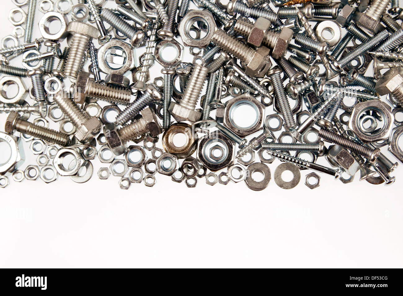 Chrome nuts and bolts closeup Stock Photo - Alamy