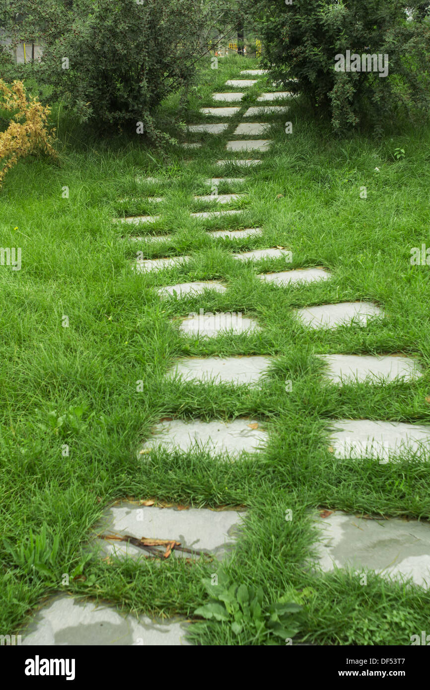stone walkway on the grass Stock Photo - Alamy