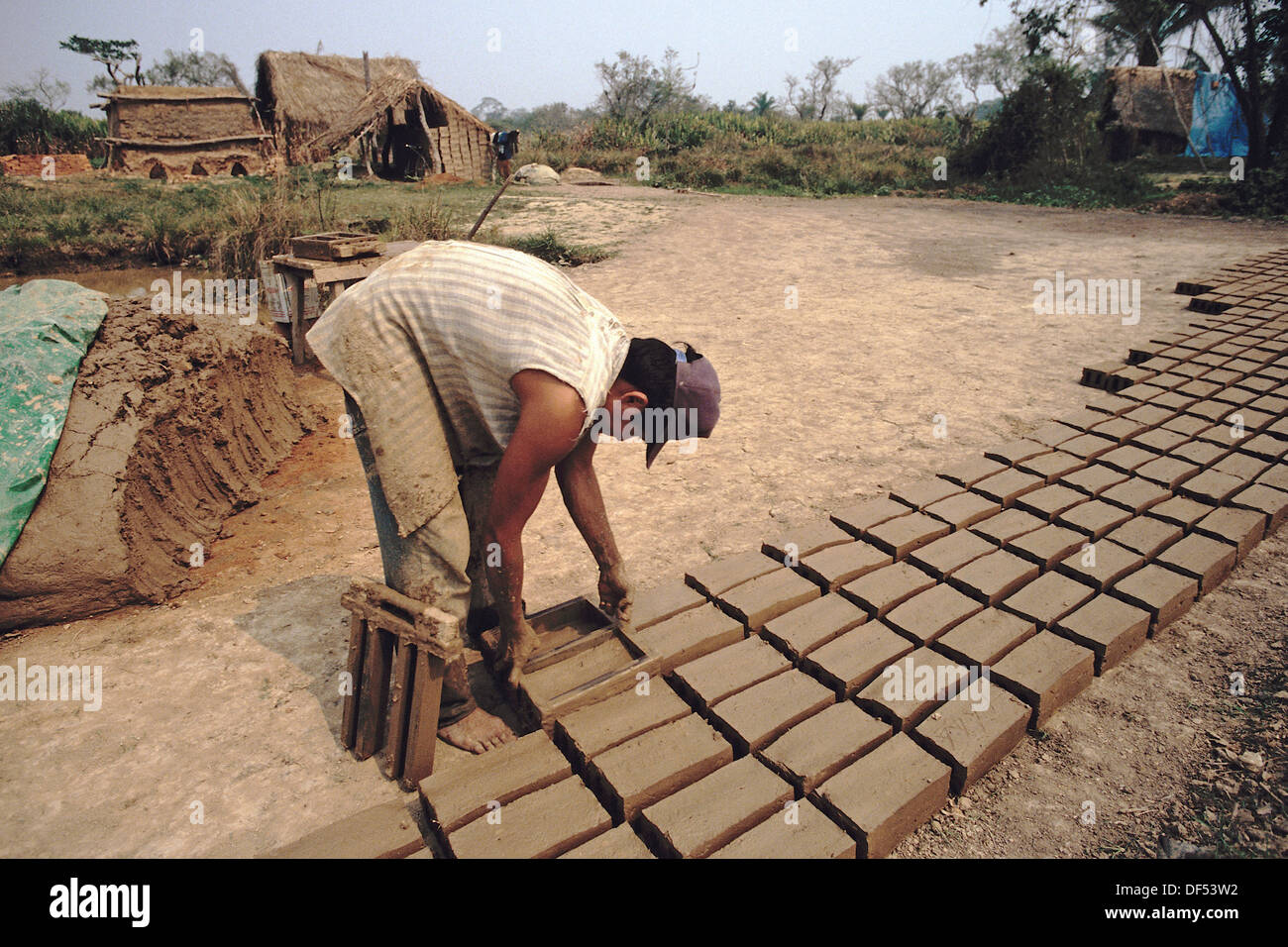 Man Making Mud Bricks Stock Photos & Man Making Mud Bricks Stock Images ...