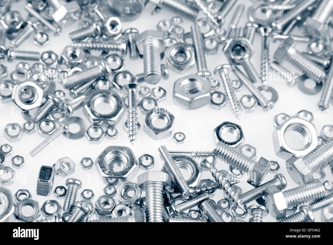 Chrome nuts and bolts closeup Stock Photo - Alamy