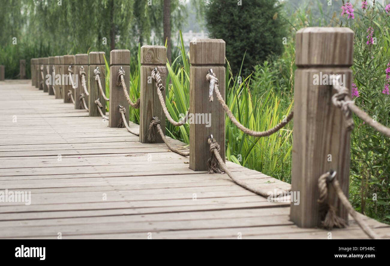 wooden path with railing Stock Photo - Alamy