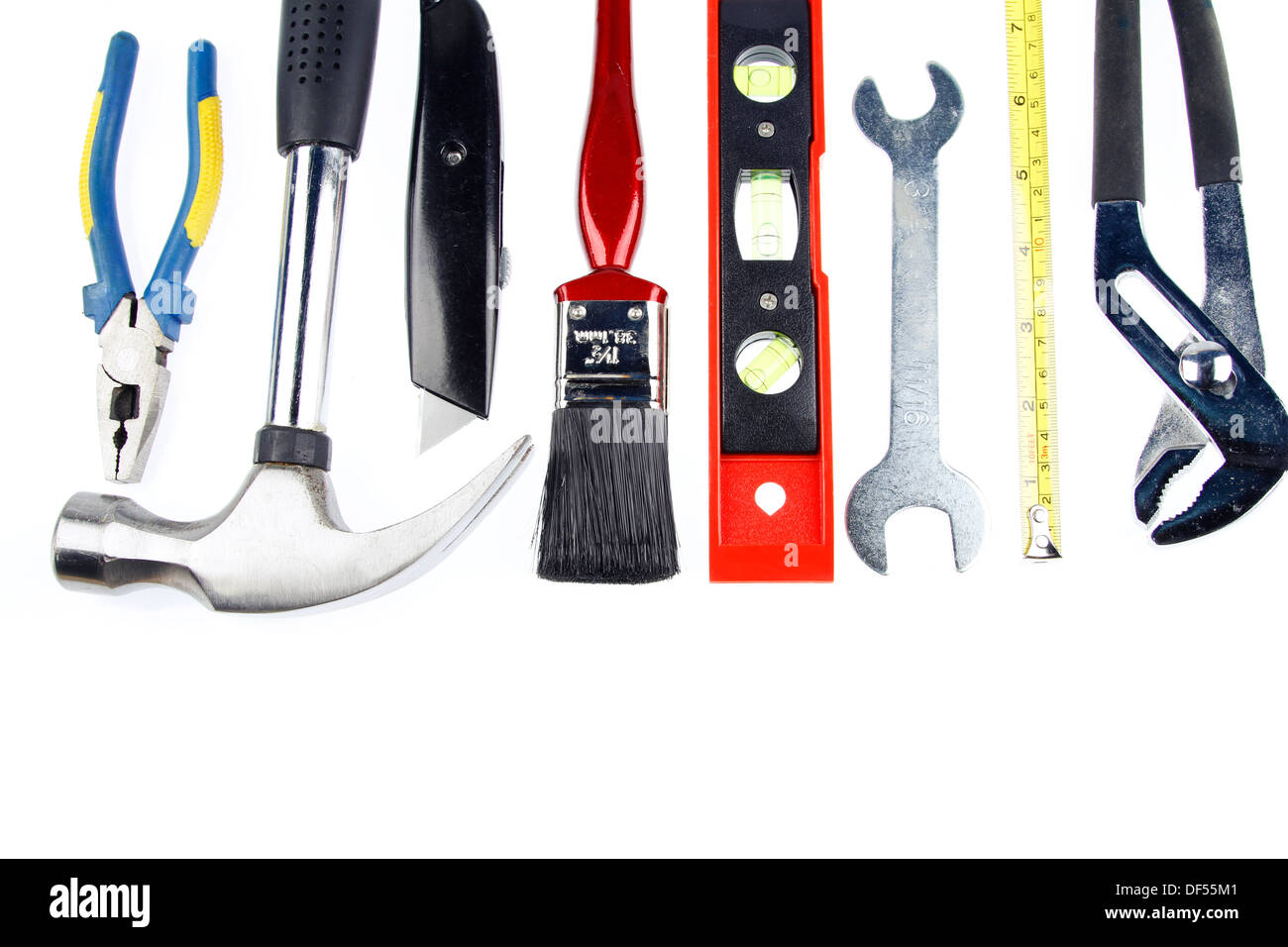 Assortment of tools on plain background Stock Photo - Alamy