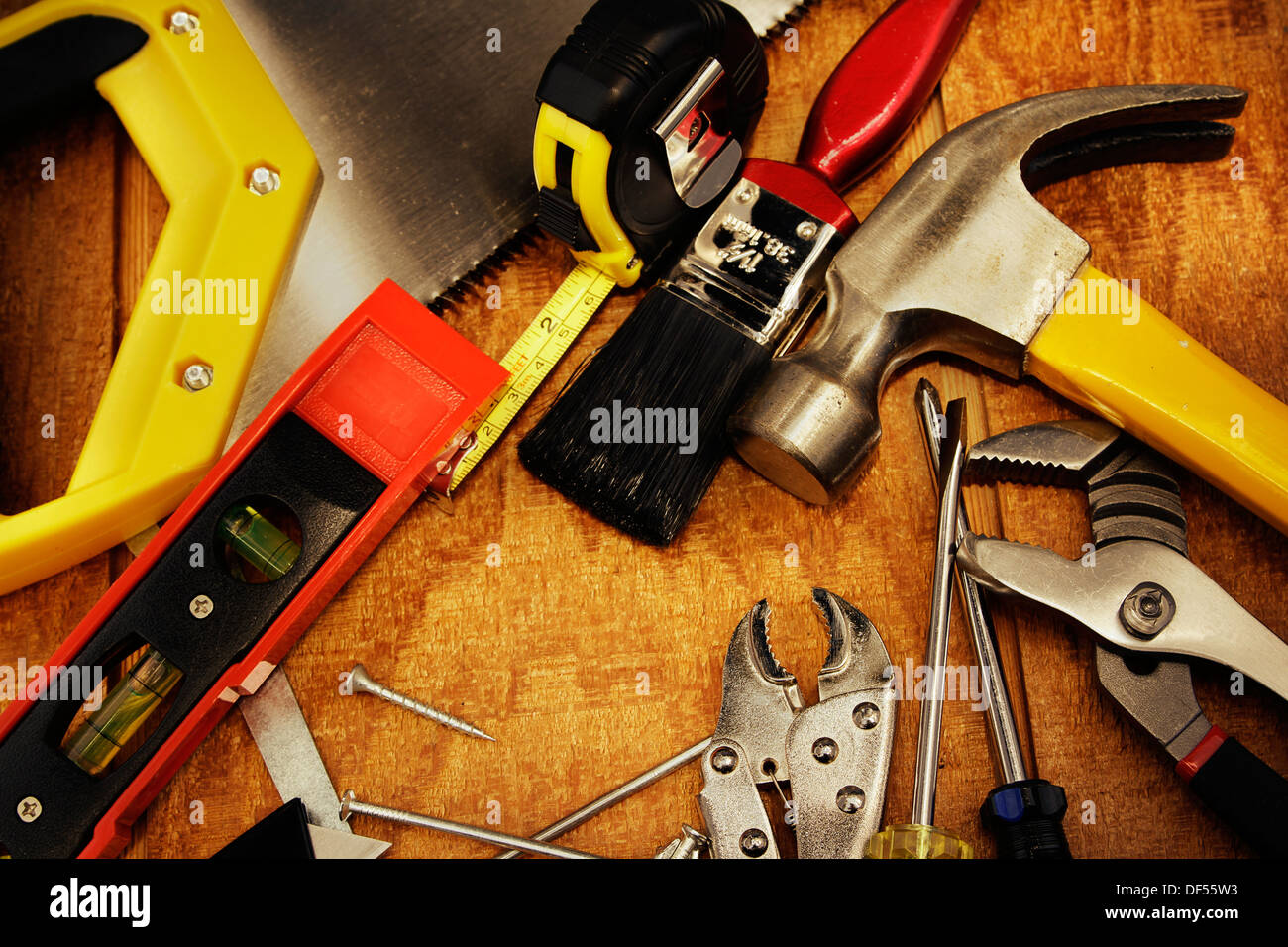 Assorted work tools on wood Stock Photo - Alamy