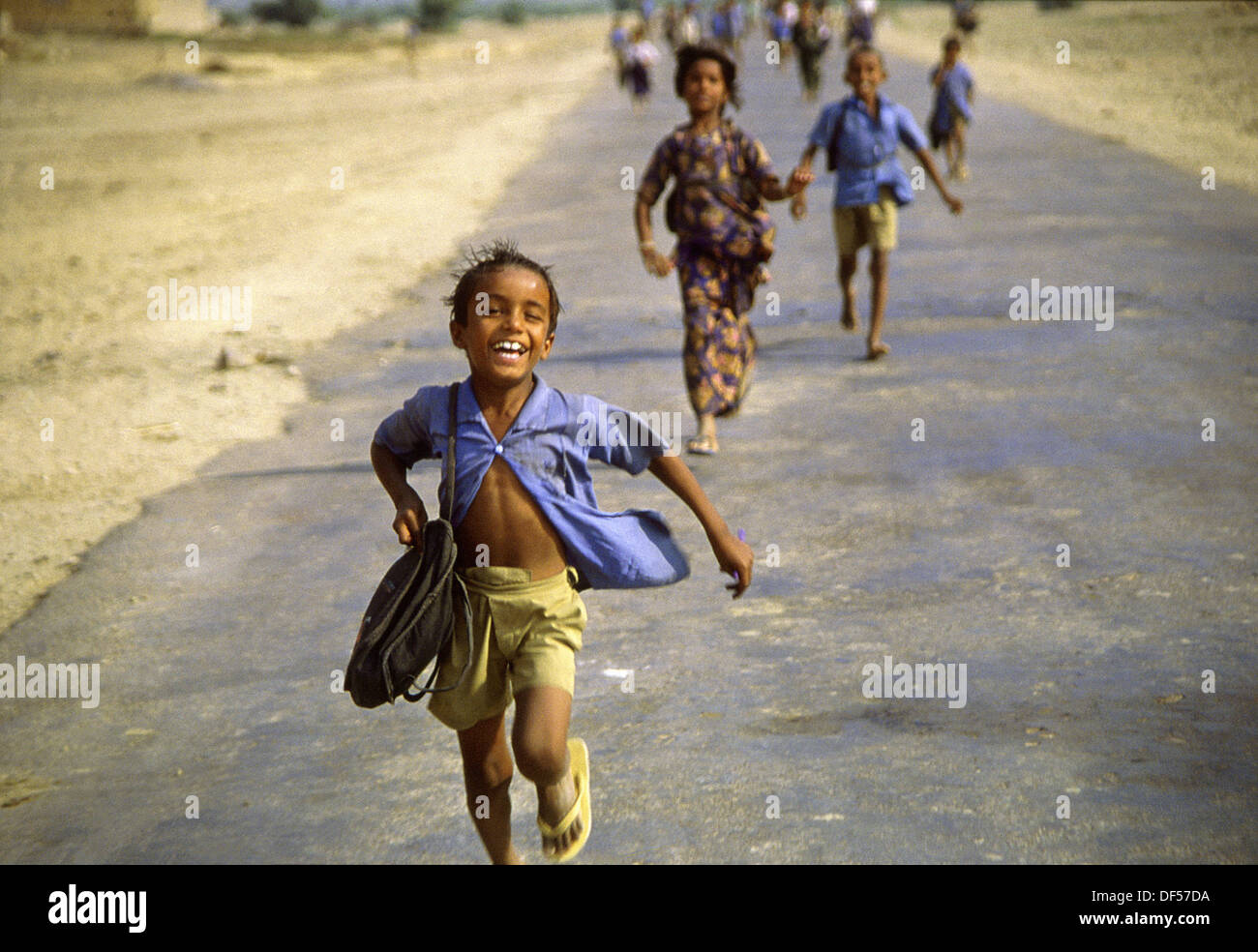 School children coming out of school hi-res stock photography and ...