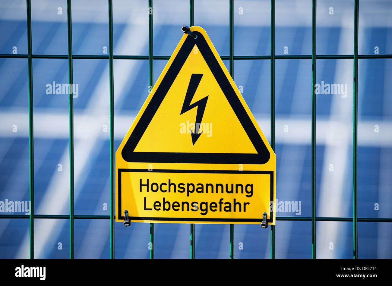 Danger Electrical Hazard High Voltage Sign With Solar Panels in the ...