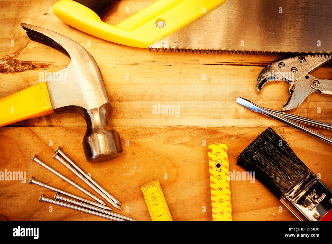 A variety of tools on wood. Advertising space Stock Photo - Alamy