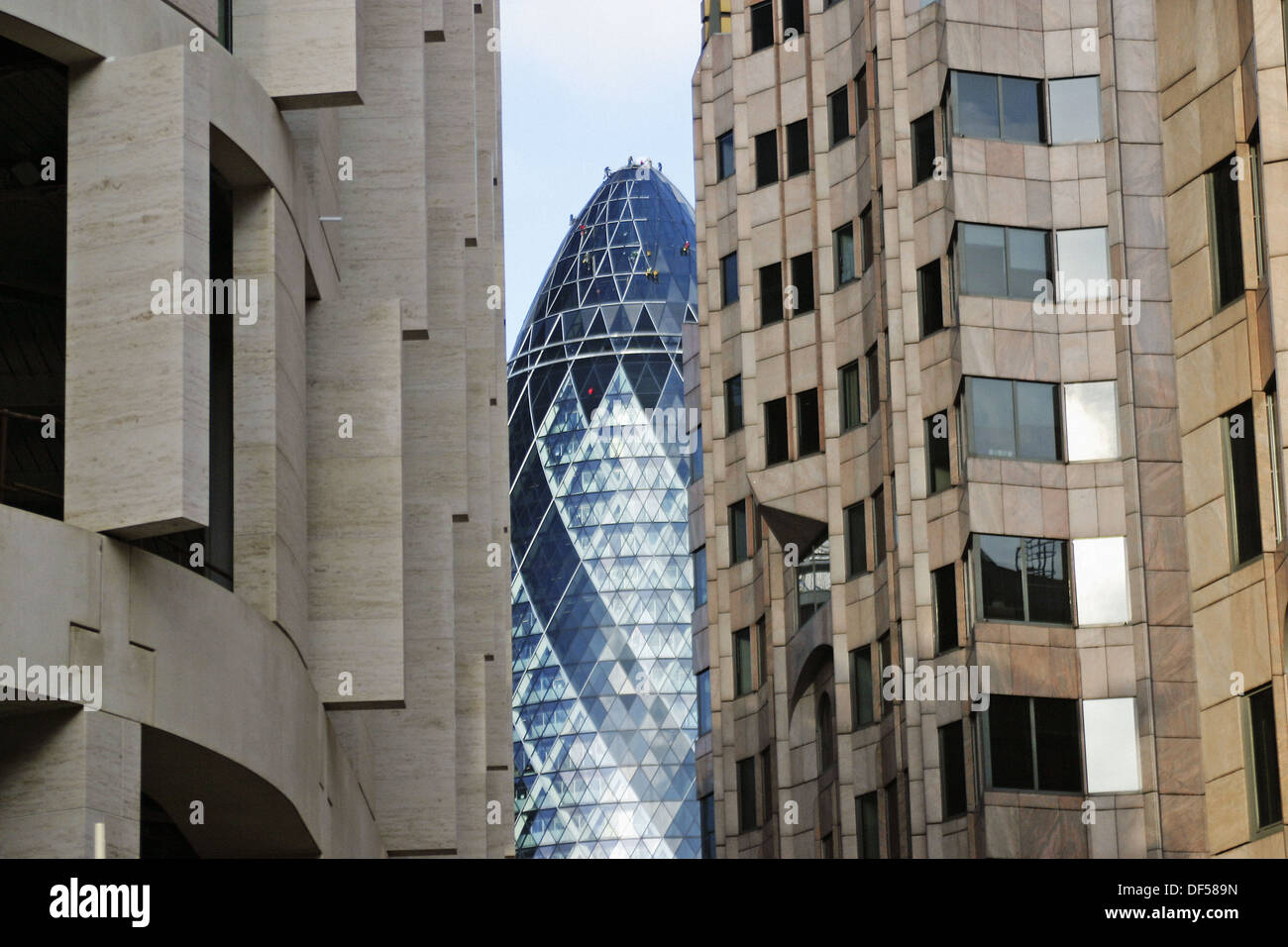 Swiss Re building and other modern building. The City. London. England ...