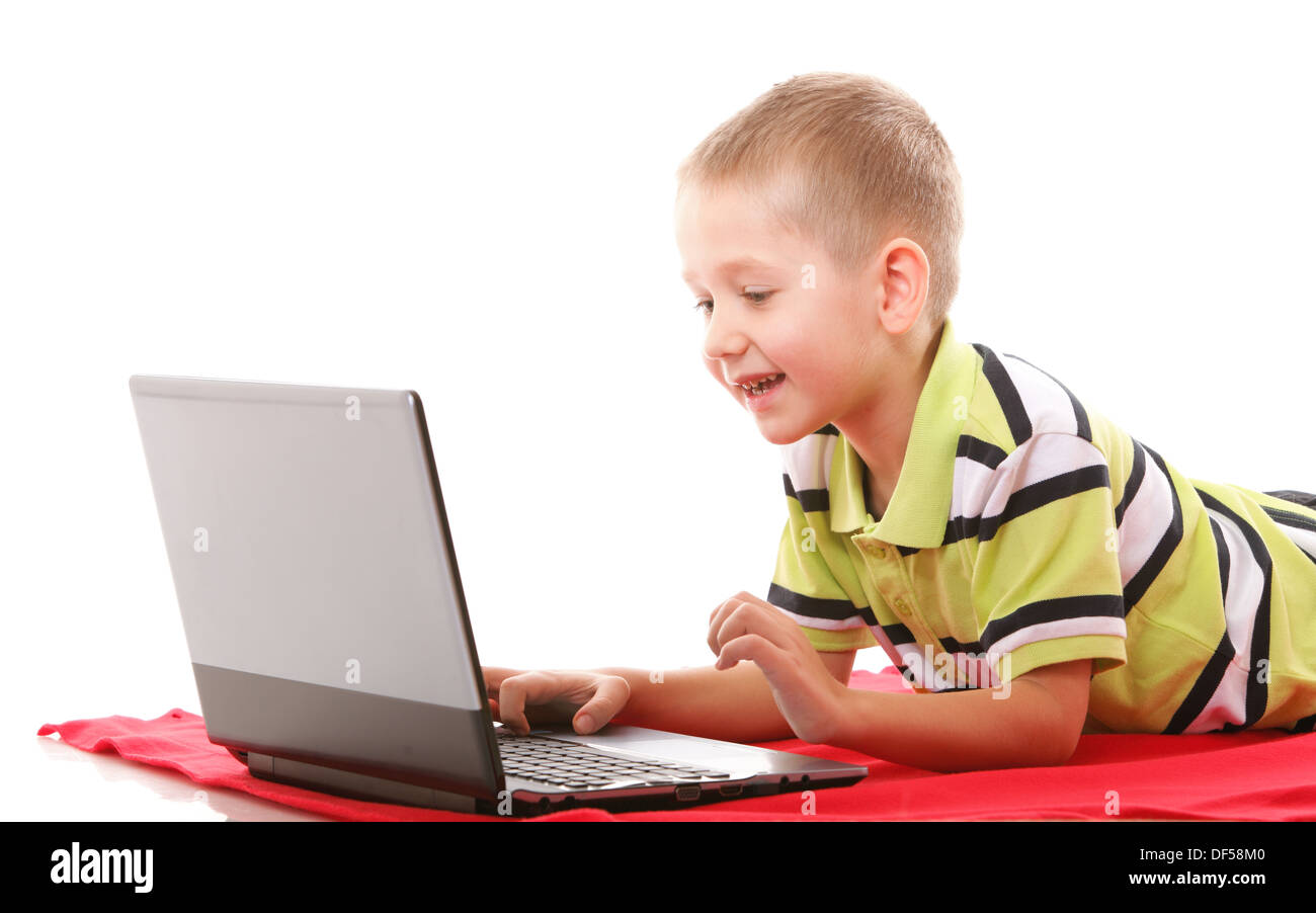 Computer addiction child boy with laptop notebook isolated on white ...