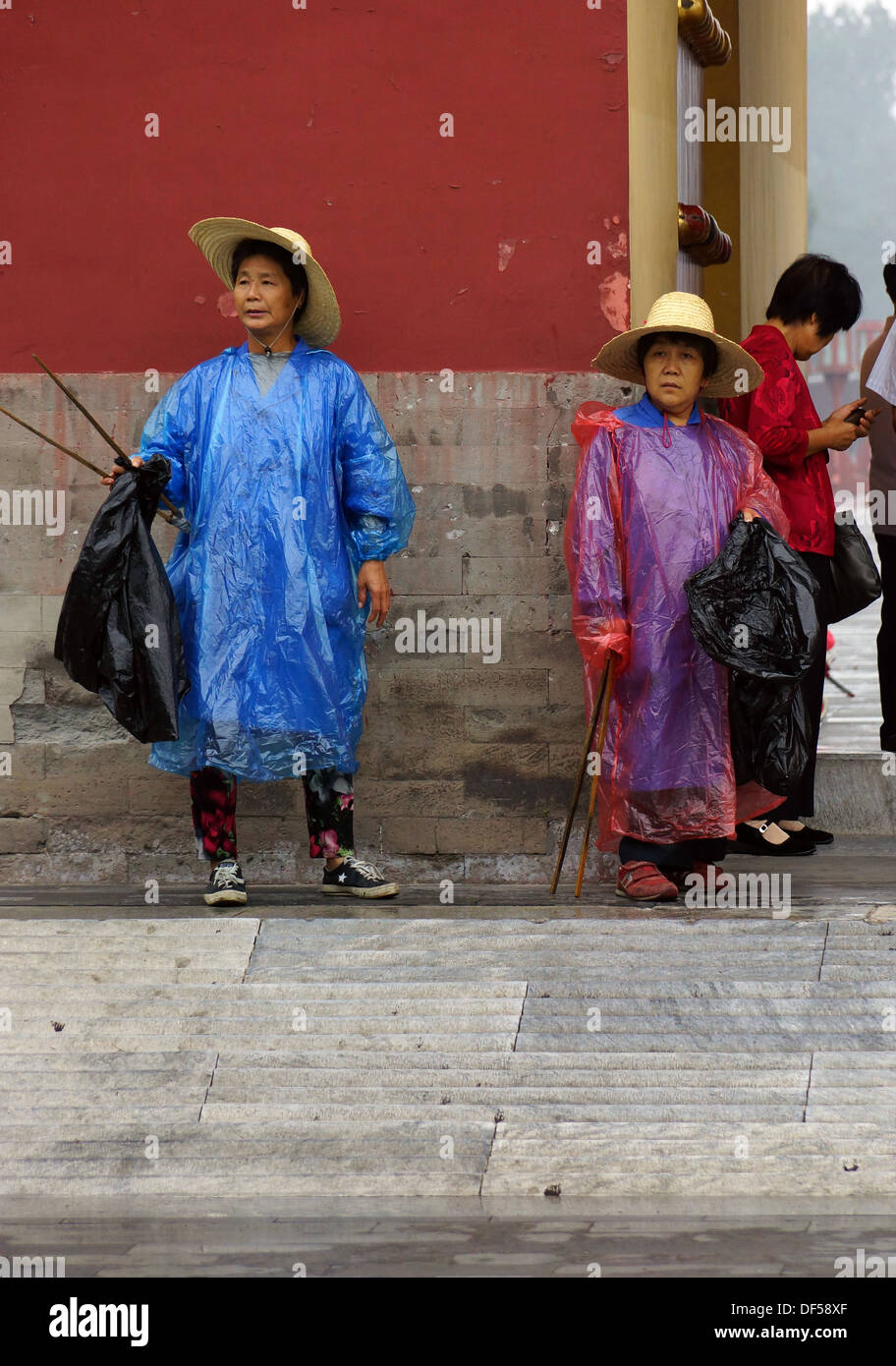 Two Chinese female street cleaners at the Temple of Heaven, Beijing ...