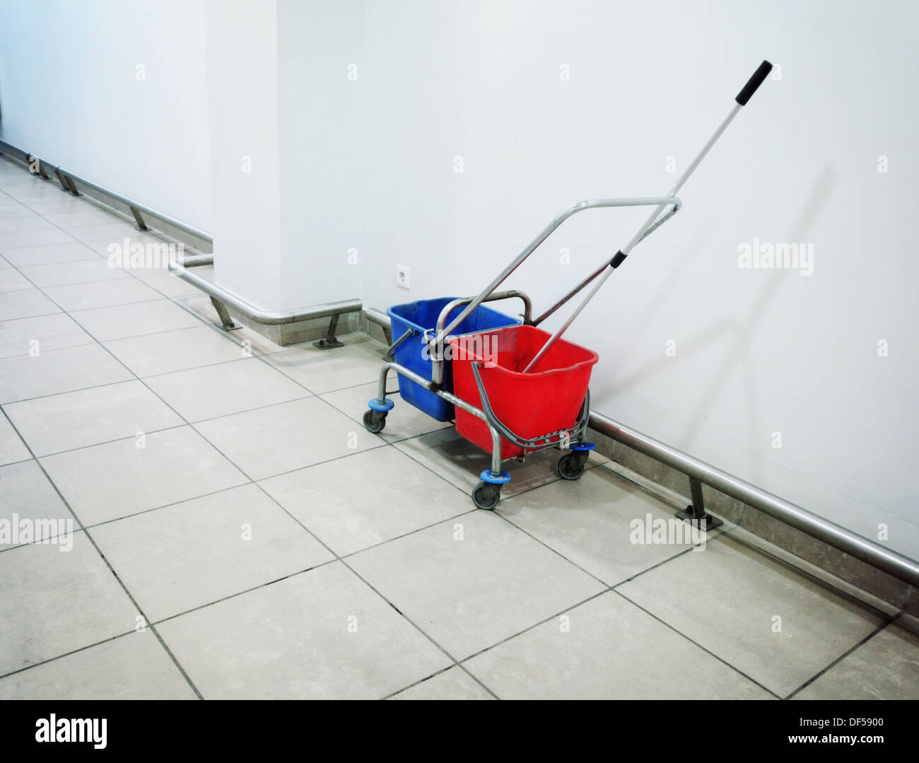 Industrial mop and bucket indoor Stock Photo - Alamy