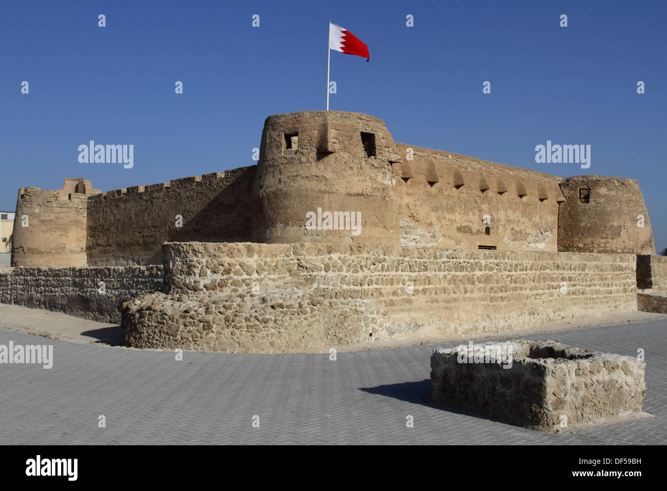 Arad Fort in Muharraq, Kingdom of Bahrain, with the Bahrain flag flying ...