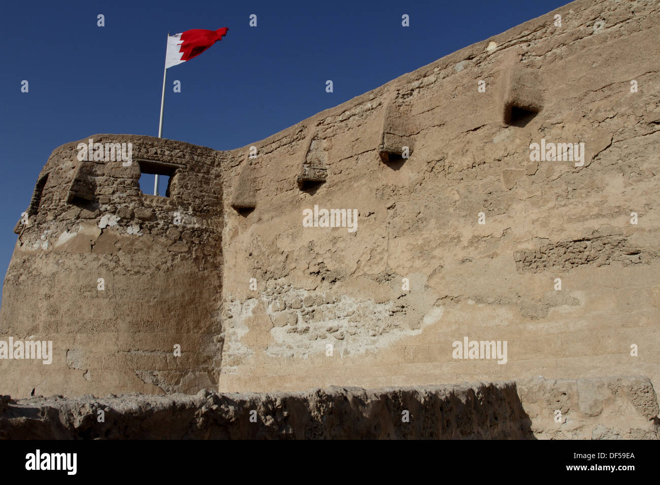 Arad Fort in Muharraq, Kingdom of Bahrain, with the Bahrain flag flying ...
