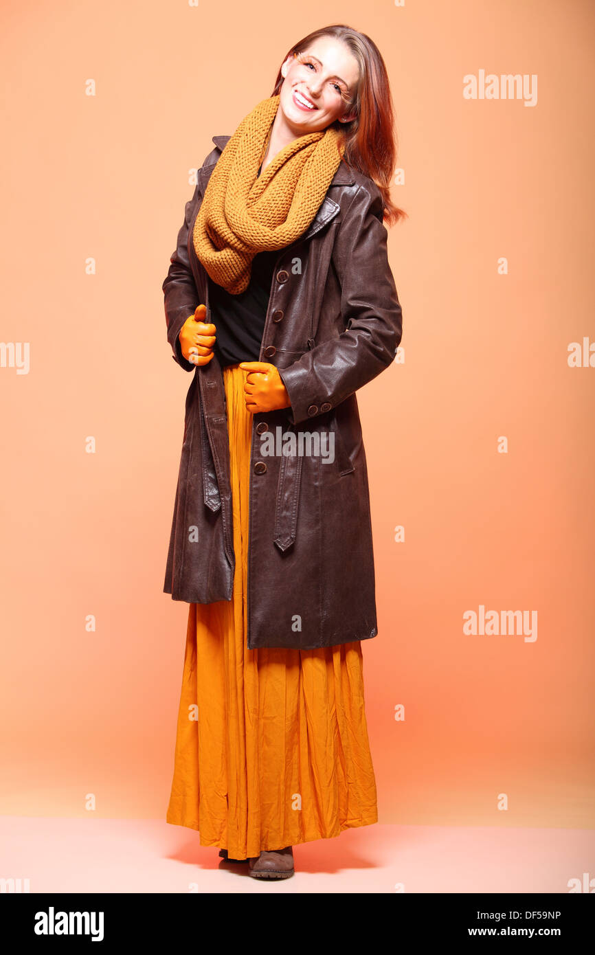 Fall. Fashion woman in autumn color fresh girl in full length long ...