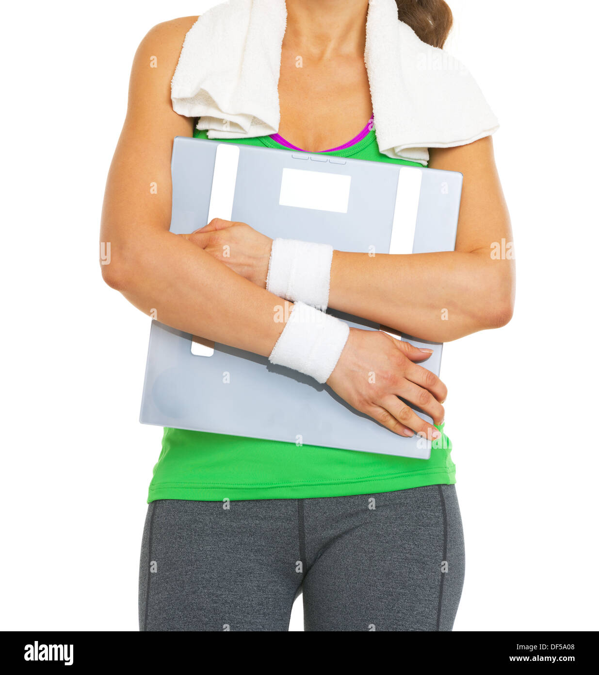 Closeup on fitness woman hugging scales Stock Photo - Alamy