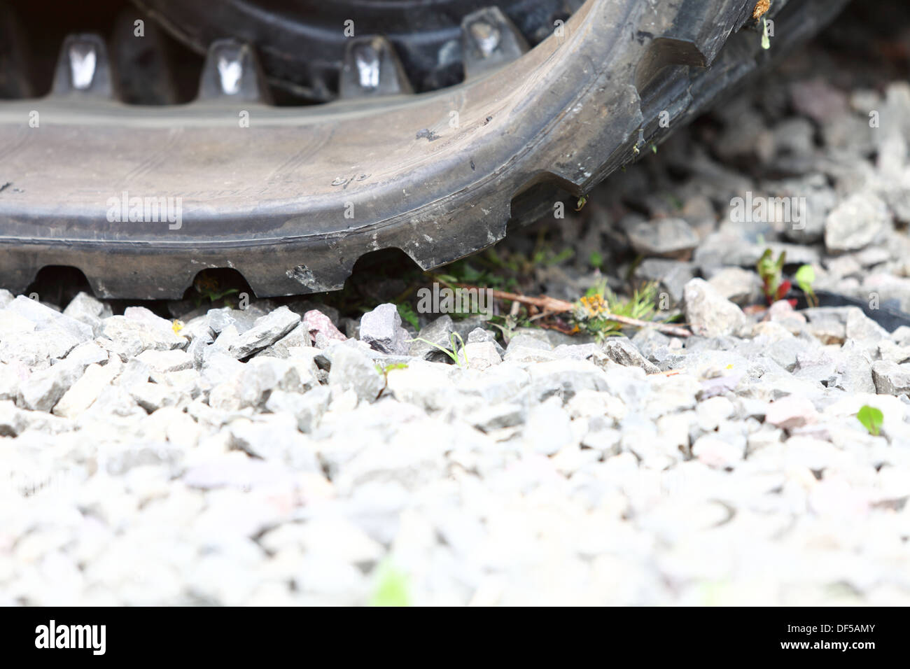 Tracks of small digger excavator heavy equipment industrial detail ...