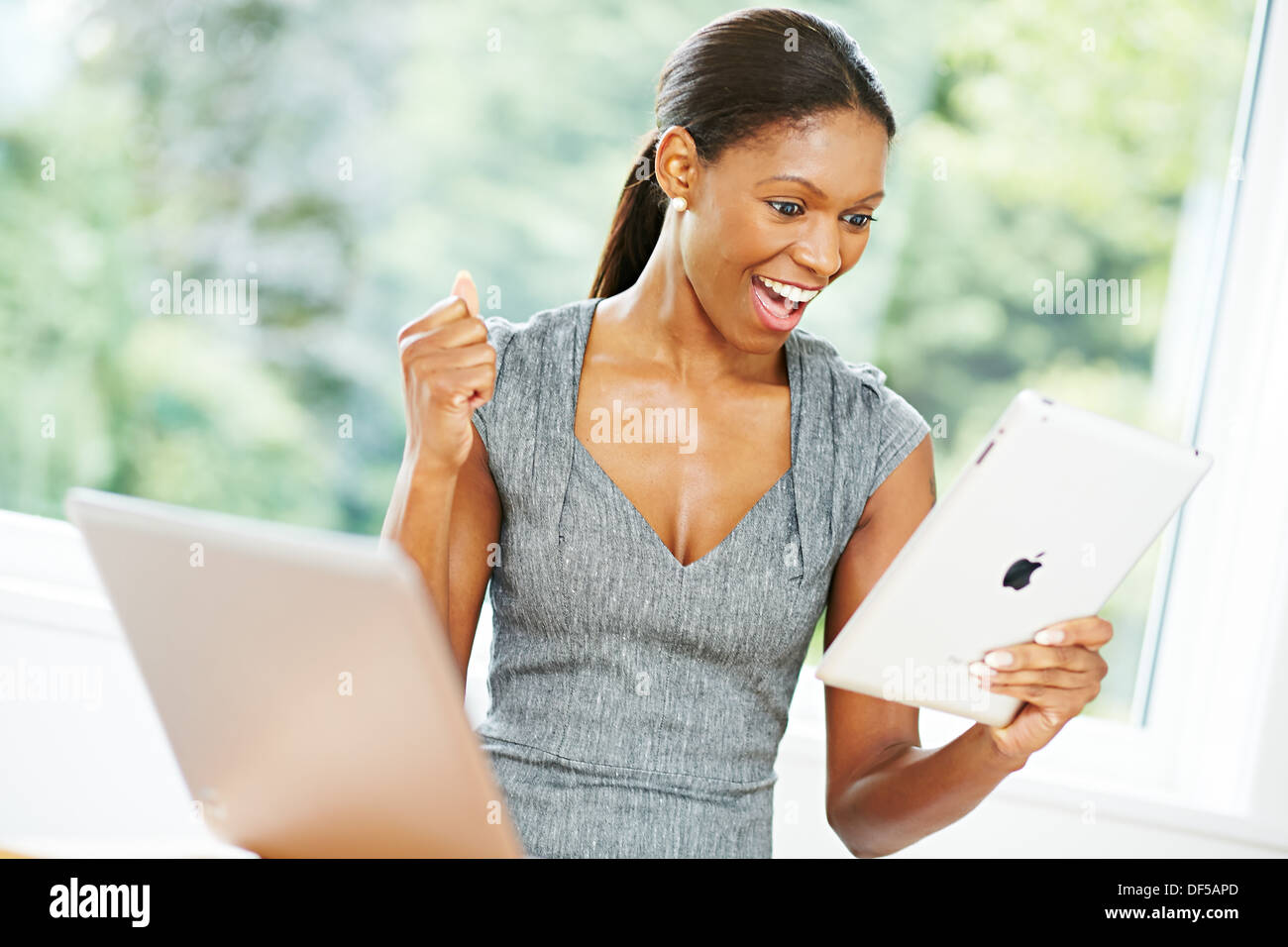 Teen looking at computer won hi-res stock photography and images - Alamy