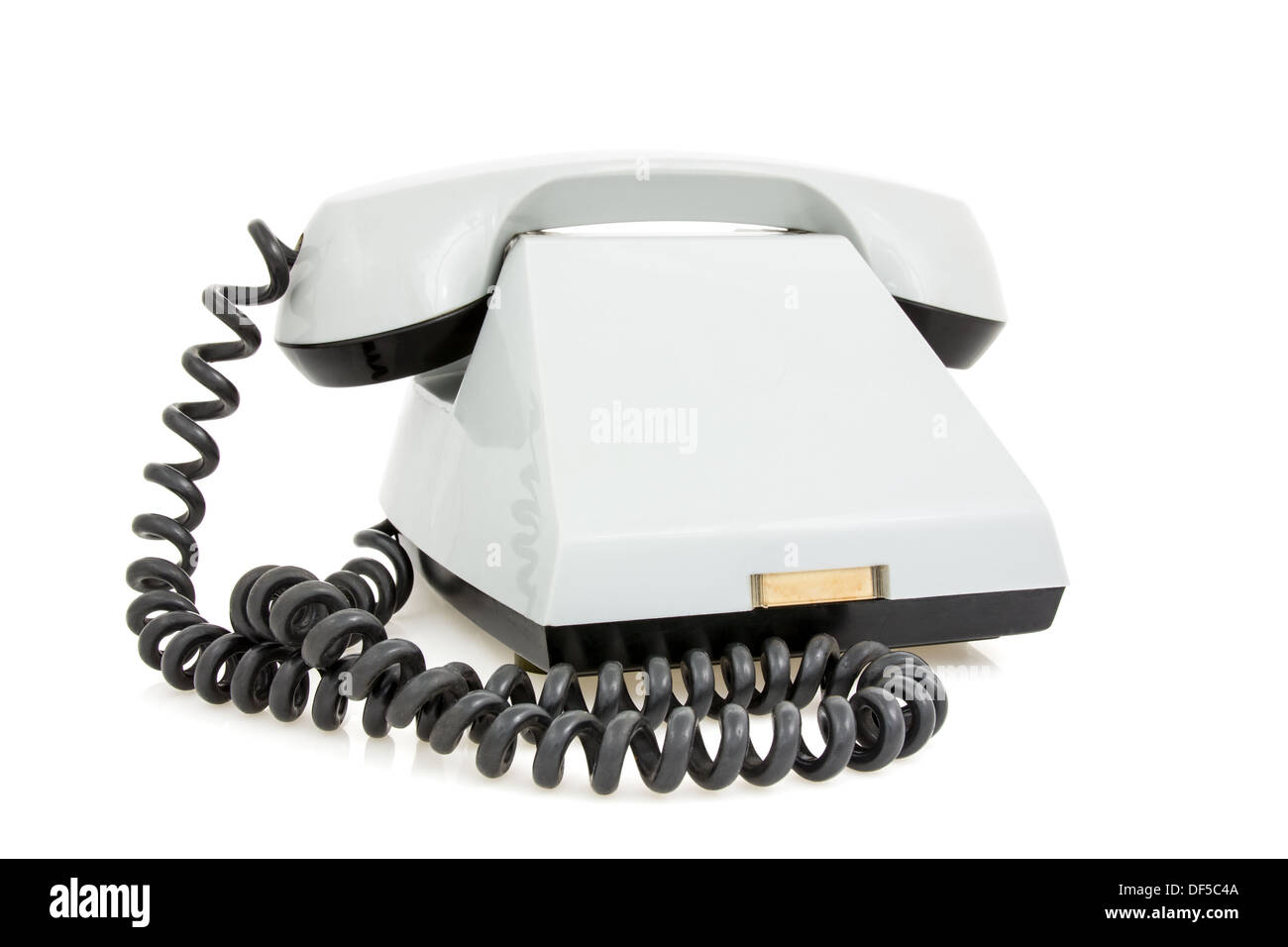 Old fashioned telephone over a white background Stock Photo - Alamy