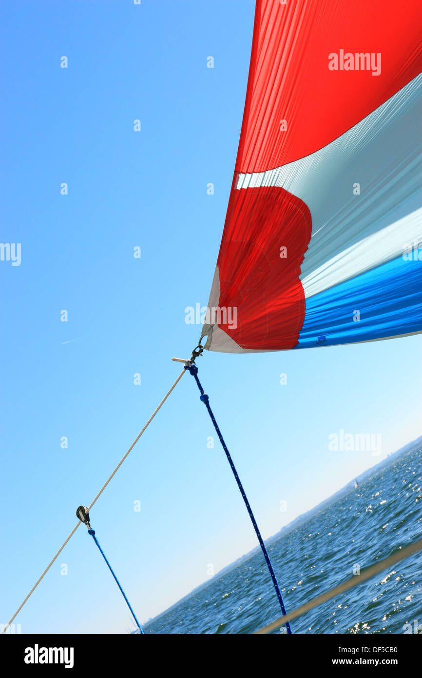 The wind has filled the spinnaker on sailing yacht. Detail of a ...