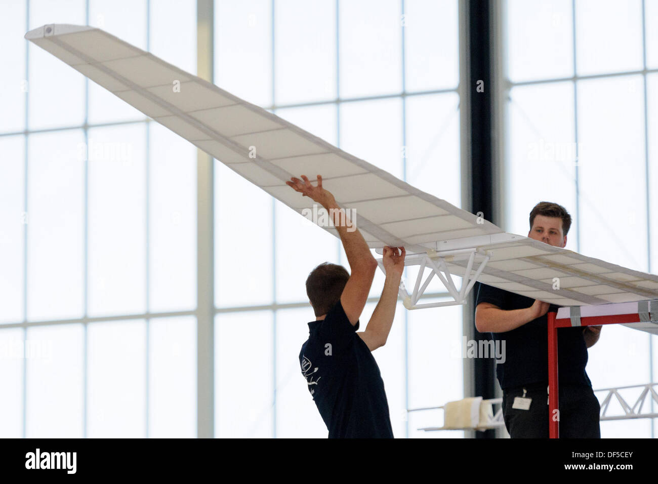 Braunschweig, Germany. 28th Sep, 2013. A paper plane is assembled in a ...