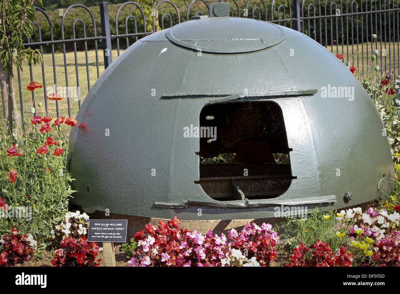 A restored World War two airfield defence turret on display at a museum ...