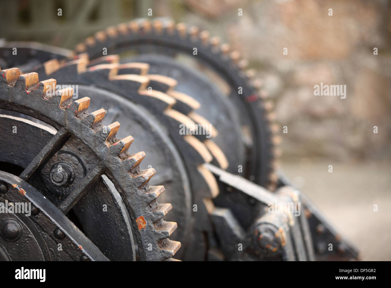 Close up steel cog wheels metal gears mechanical ratchets machine part ...