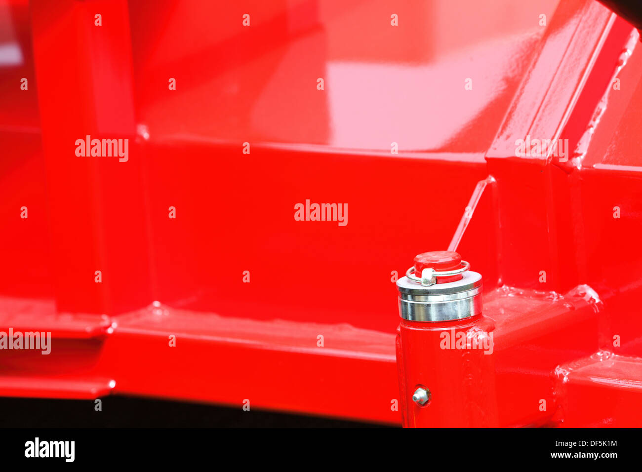 Screw bolt on red machine nut at surface of steel plate detail of ...