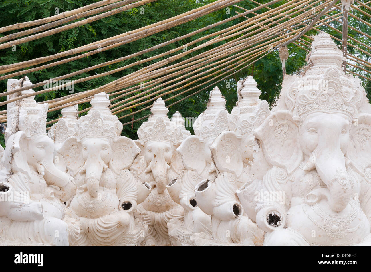 Workers in India making idols in makeshift factories on the side of the ...