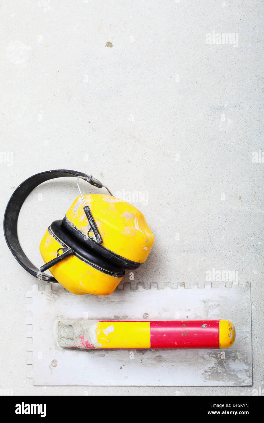 Ear hearing protection. Yellow working protective headphones noise ...