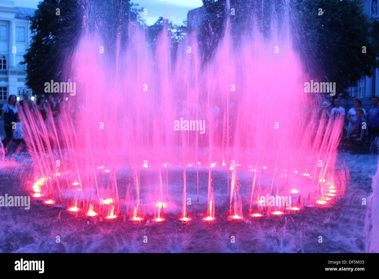 beautiful colored fountain in the city park Stock Photo - Alamy