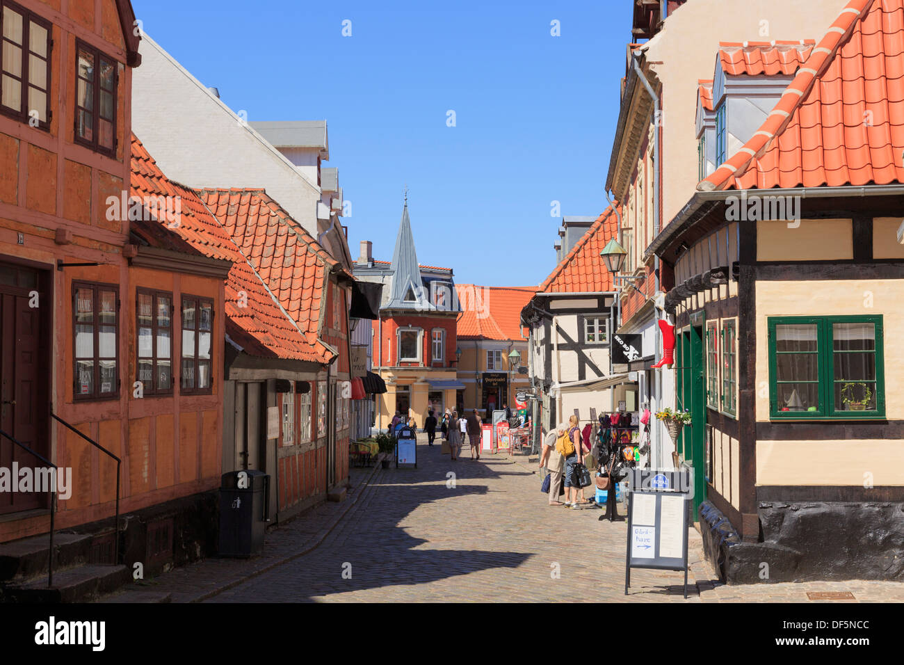 Old medieval Danish town cobbled street scene on Adelgade in Ebeltoft ...