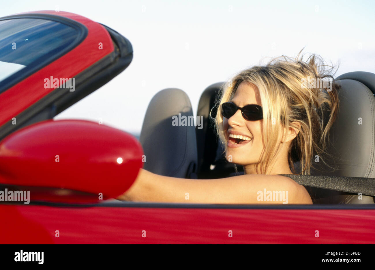 Convertible car girl driving hi-res stock photography and images - Alamy