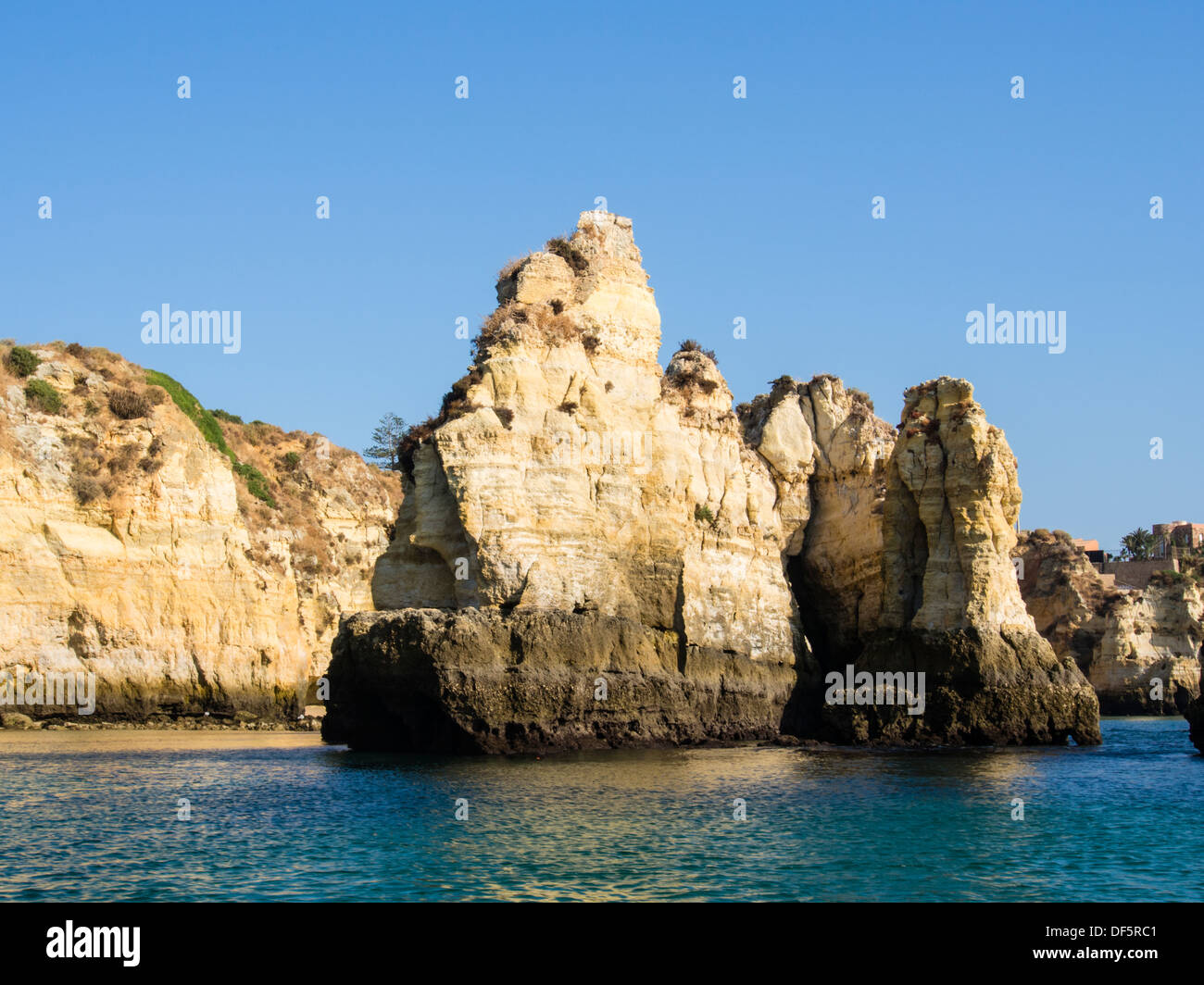 Rugged cliffs on the Algarve coastline near Lagos, Portugal Stock Photo ...